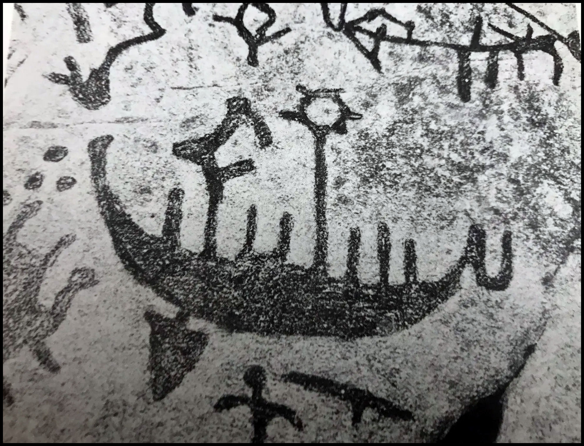 Symbols at several North American petroglyph sites, originated in the ...